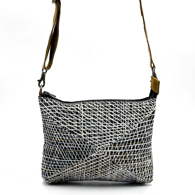 Cross Body Bag featuring Pupuni Jilamara by Paulina Puruntatameri ...